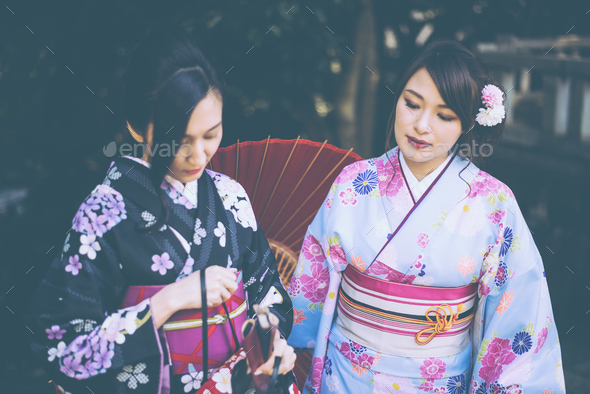 Two japanese girls wearing kimonos traditional clothes, lifestyle ...