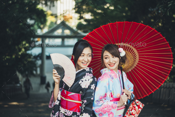 Two japanese girls wearing kimonos traditional clothes, lifestyle ...
