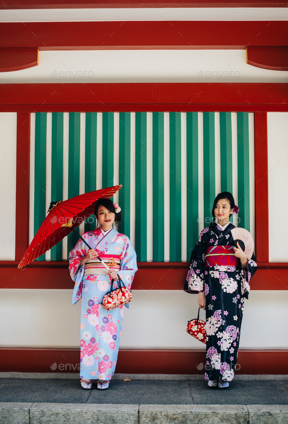 Two japanese girls wearing kimonos traditional clothes, lifestyle ...