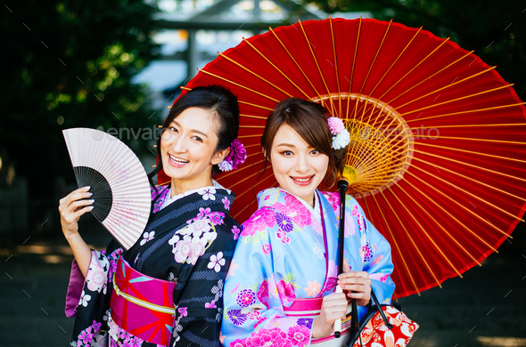 Two japanese girls wearing kimonos traditional clothes, lifestyle ...