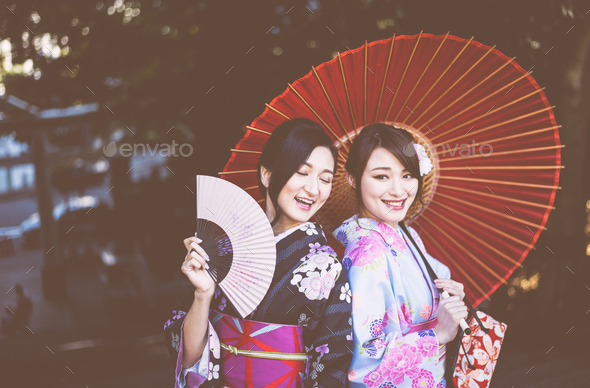 Two japanese girls wearing kimonos traditional clothes, lifestyle ...