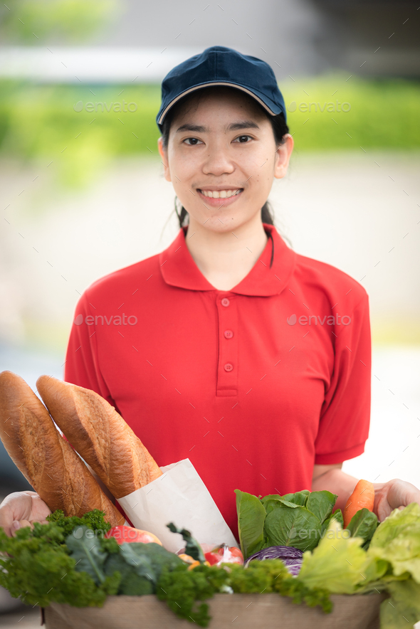 Delivery company worker holding grocery bag, food order, supermarket ...