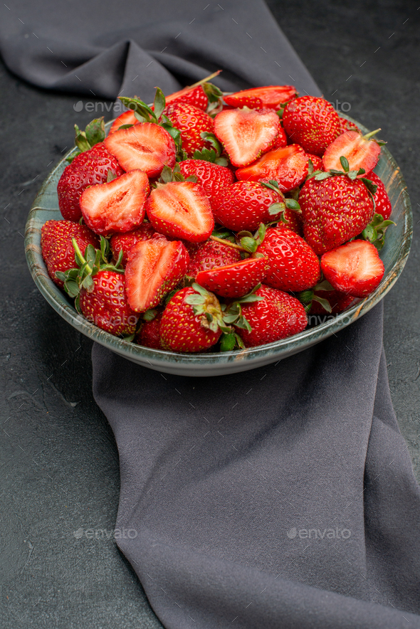 front view fresh red strawberries inside plate on dark background color ...