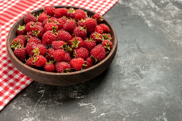 front view fresh red raspberries inside plate on grey background color ...