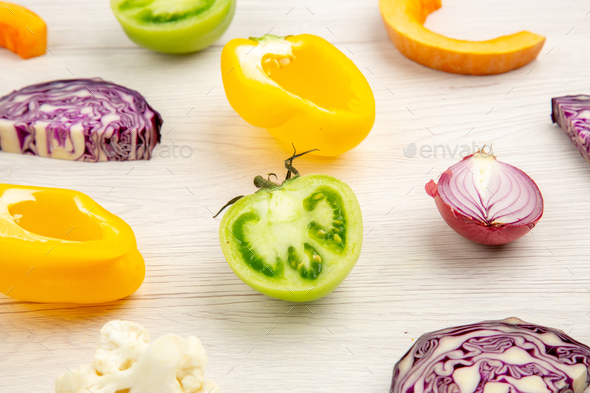 bottom close view cut vegetables red cabbage cauliflower yellow bell ...