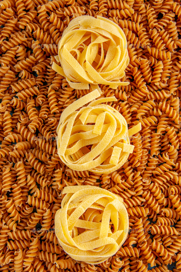 Vertical view and high resolution photo of various raw Italian pastas ...