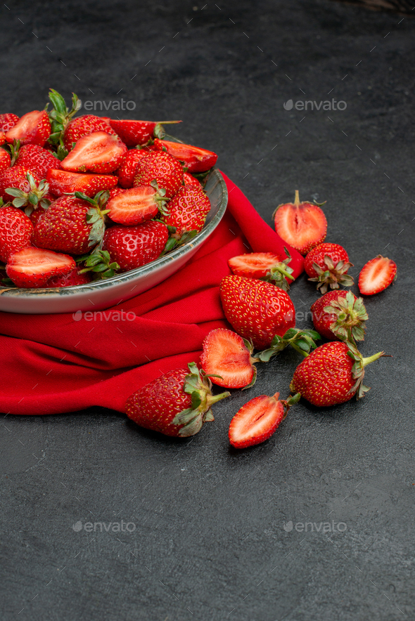 front view fresh red strawberries inside plate on dark background color ...