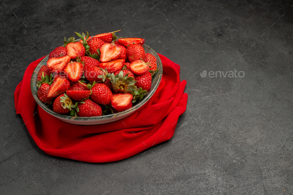 front view fresh red strawberries inside plate on dark background ...