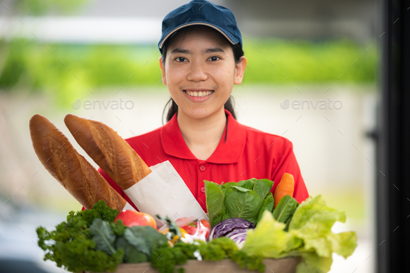 food delivery and courier service concept, Delivery staff in uniform ...