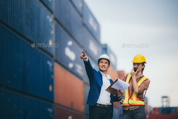Business executives And engineers visiting industrial plants warehouses ...