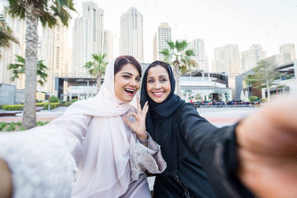 Two arabian girlfriends bonding and having fun Stock Photo by ...