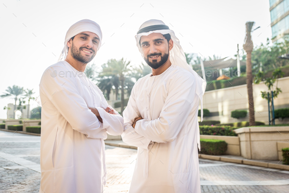 Two men with kandora in Dubai Stock Photo by oneinchpunchphotos | PhotoDune