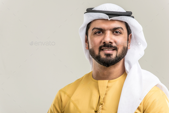 Arabian man with traditional dress Stock Photo by oneinchpunchphotos