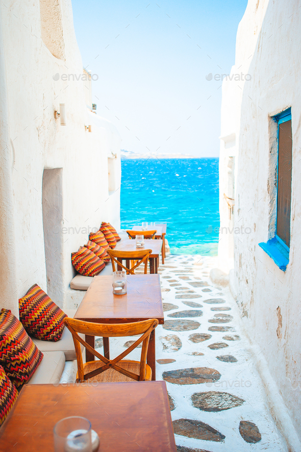 Typical Greek bar in Mykonos town with sea view, Cyclades islands ...