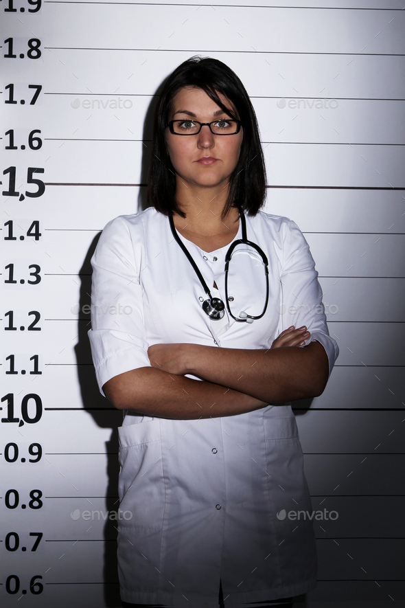 Doctor over jail background Stock Photo by Microstock_Growth | PhotoDune