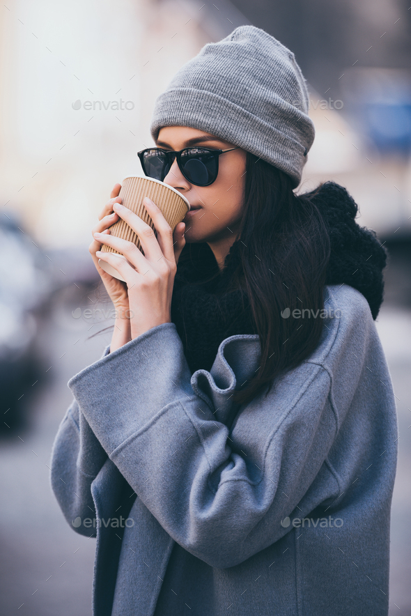 Sip of fresh coffee. Stock Photo by gstockstudio | PhotoDune