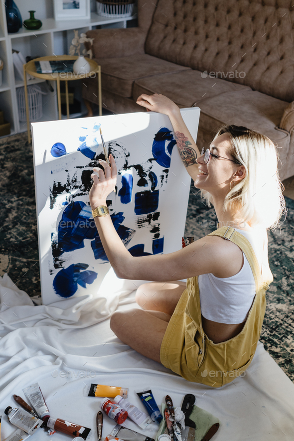 Beautiful young woman artist drawing Stock Photo by diignat | PhotoDune