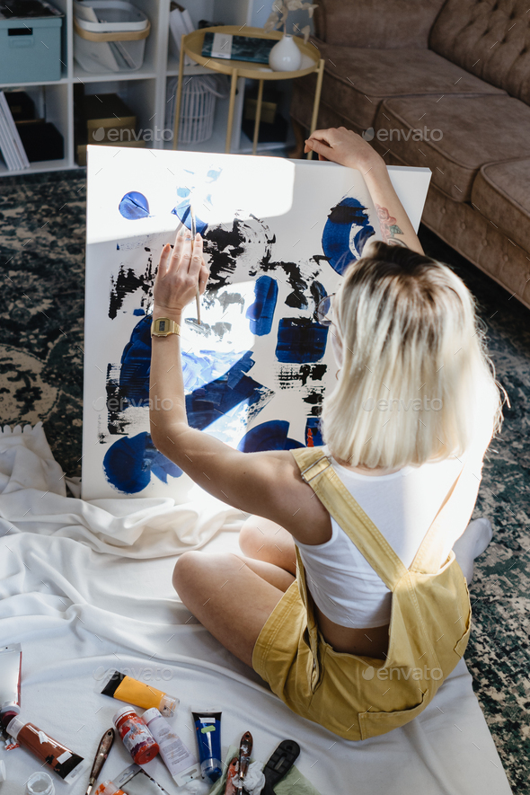 Beautiful young woman artist drawing Stock Photo by diignat | PhotoDune