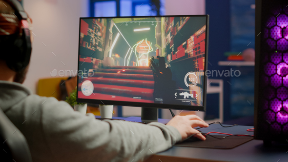 Gamer man with professional headphones relaxing in gaming room Stock ...