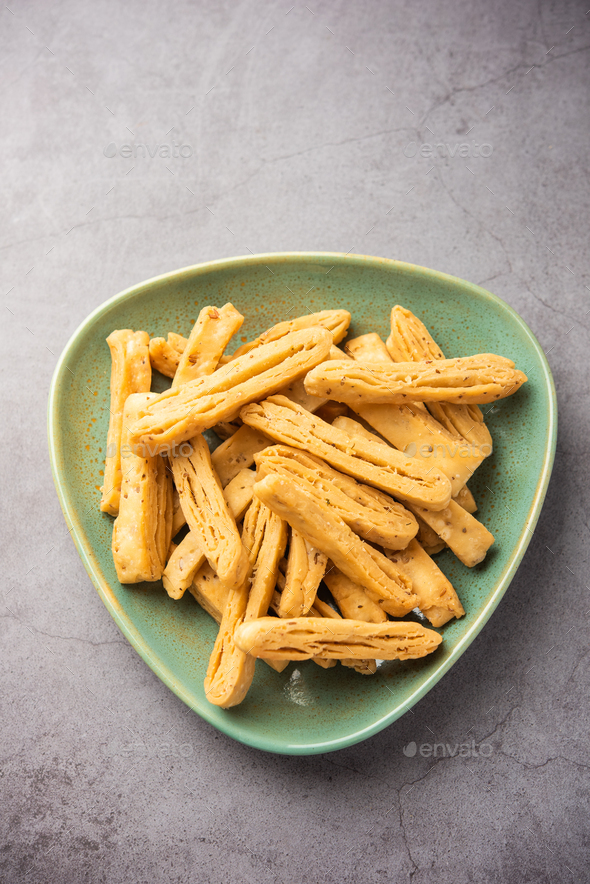 Indian popular snack Layered mathri or mathiya Stock Photo by ...