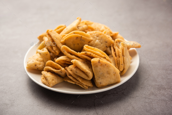 Indian popular snack Layered mathri or mathiya Stock Photo by ...