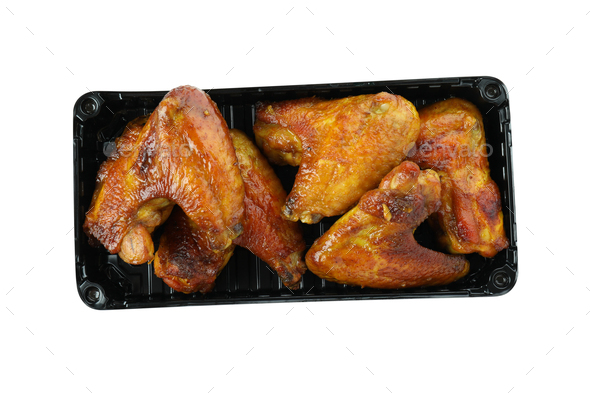 Container with baked chicken wings isolated on white background Stock ...