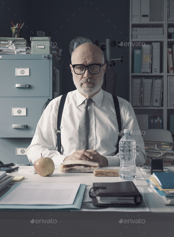 Sad desk lunch in the office Stock Photo by stokkete | PhotoDune