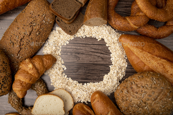 top view of oat-flakes set in circular shape and breads around as ...