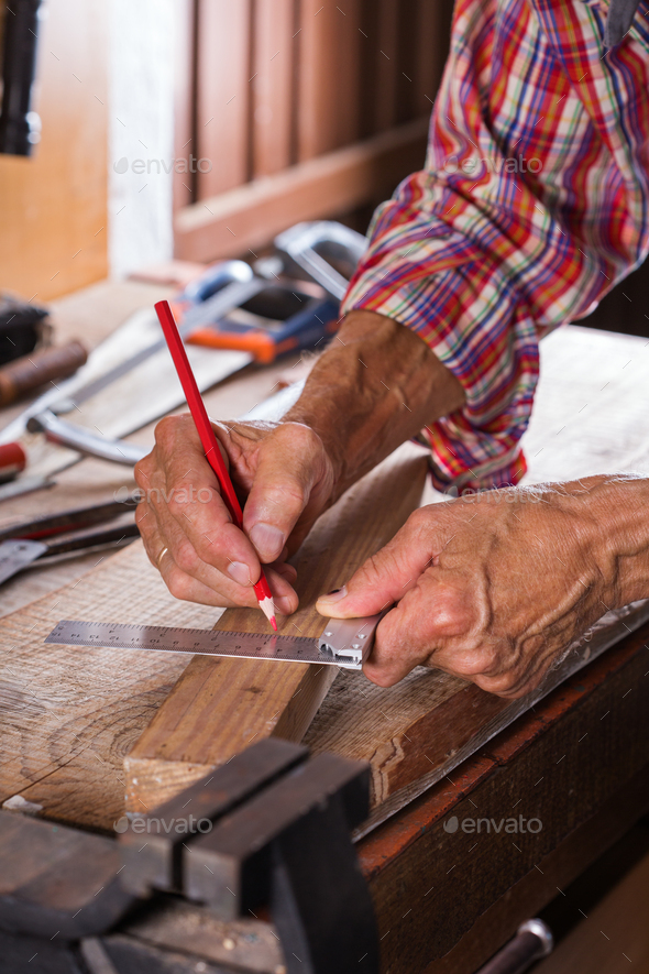 Carpenter working on the work bench, joinery tools and woodwork Stock ...
