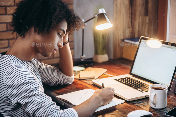 Concentrated at work. Stock Photo by gstockstudio | PhotoDune