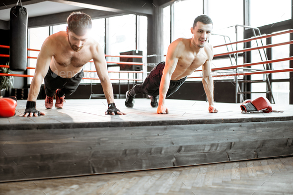 Boxers doing push-ups at the gym Stock Photo by RossHelen | PhotoDune