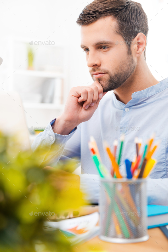 Concentrated on work. Stock Photo by gstockstudio | PhotoDune