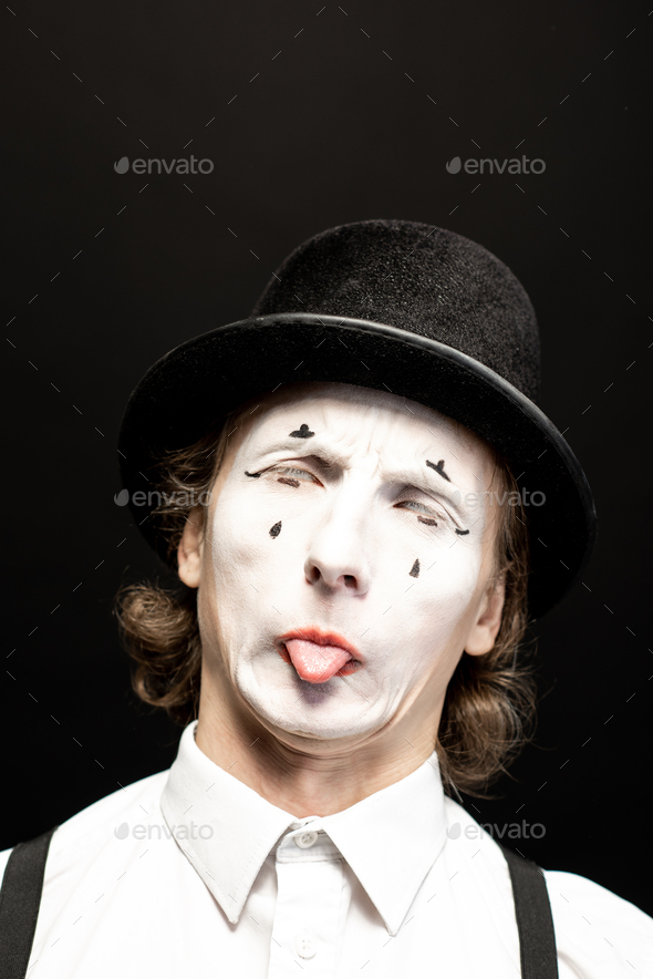 Pantomime on the black background Stock Photo by RossHelen | PhotoDune
