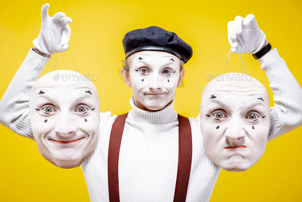 Pantomime with different facial masks Stock Photo by RossHelen | PhotoDune
