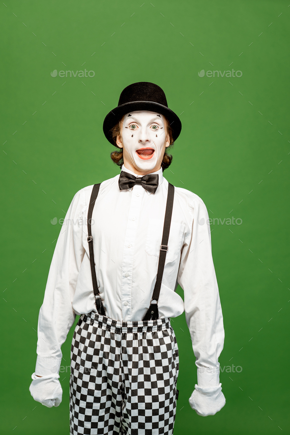 Pantomime on the green background Stock Photo by RossHelen | PhotoDune