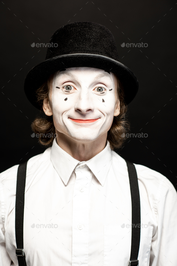 Pantomime on the black background Stock Photo by RossHelen | PhotoDune
