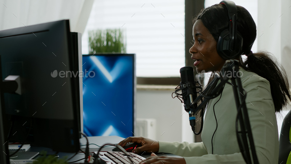 Sad black woman streamer with headphone losing videogames Stock Photo ...