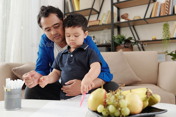 Creative boy drawing Stock Photo by DragonImages | PhotoDune