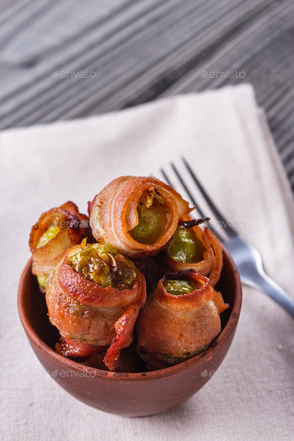fresh green Brussels sprouts wrapped in fragrant smoked bacon Stock ...