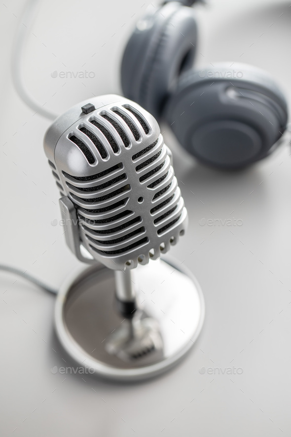 Metal retro microphone. Vintage microphone. Stock Photo by jirkaejc