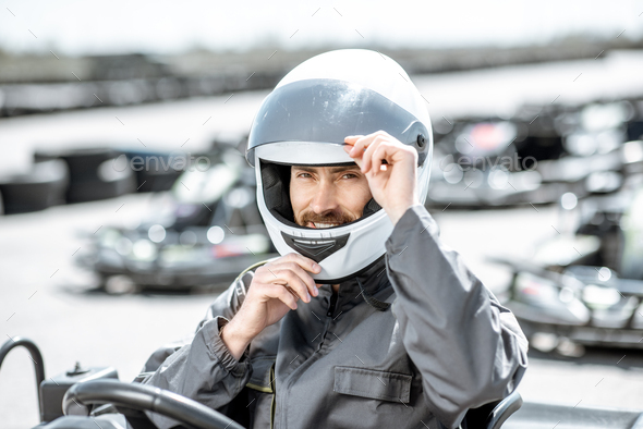 Portrait of a professional kart racer Stock Photo by RossHelen | PhotoDune