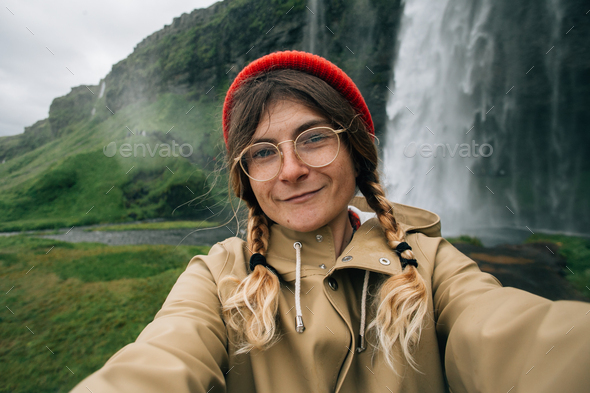 Happy woman makes selfie in iceland Stock Photo by bublikhaus | PhotoDune