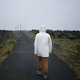 Adventure man walk in icelandic landscape alone Stock Photo by bublikhaus