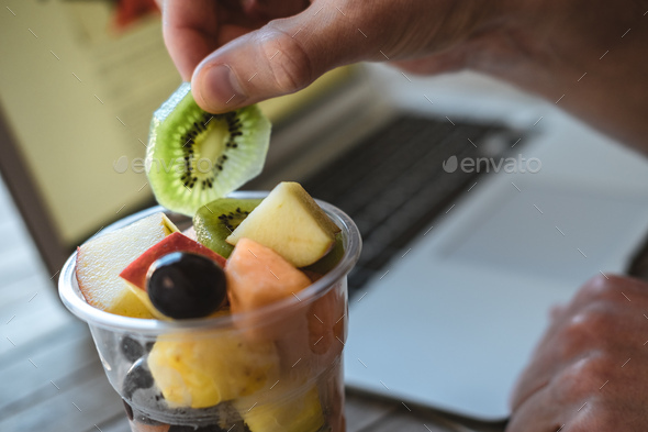 Workspace of designer: modern laptop computer with man hands and Cut ...