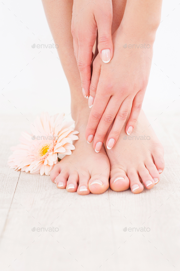 Keeping her feet clean and smooth. Stock Photo by gstockstudio | PhotoDune