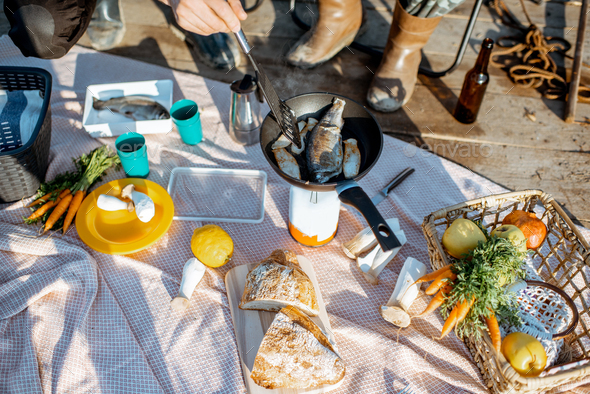 Picnic with fish and vegetables Stock Photo by RossHelen | PhotoDune