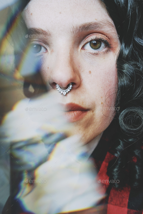 Surreal image of a young woman through a prism Stock Photo by nanihta