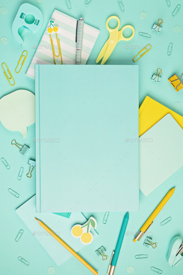 Back to school concept. School and office supplies on pastel background ...