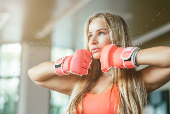 Build your body, build your character. Attractive female kickboxer ...