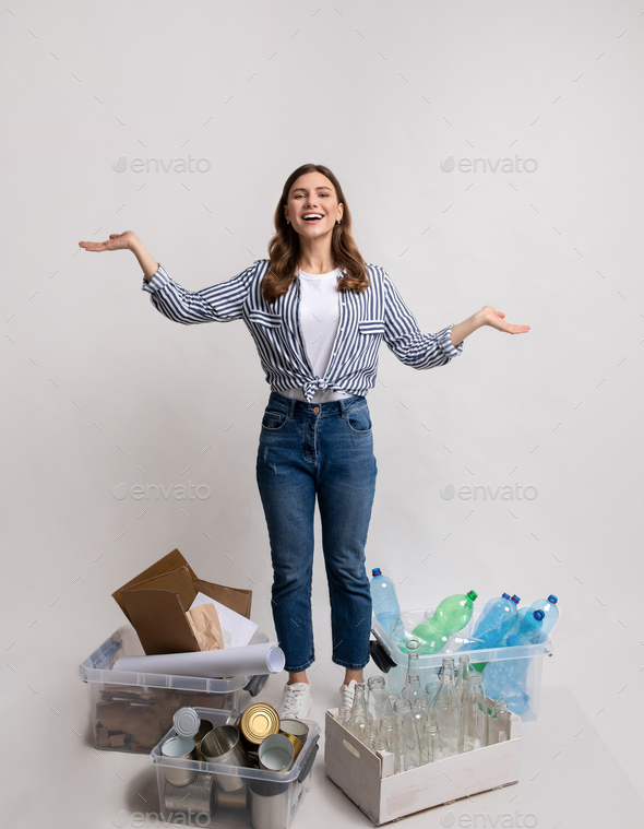 Waste Sorting. Millennial Lady Standing Among Containers With Different ...
